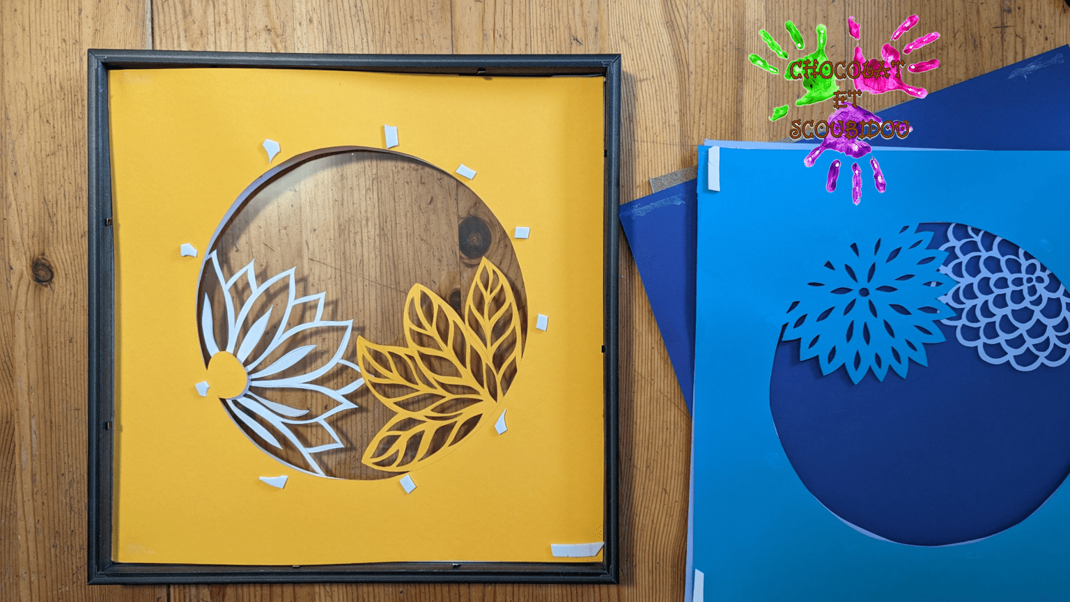 Cadre de papiers découpés superposés | Chocolat et Scoubidou